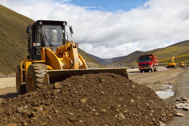 Excavator in road stock image. Image of excavation, hole - 30610743