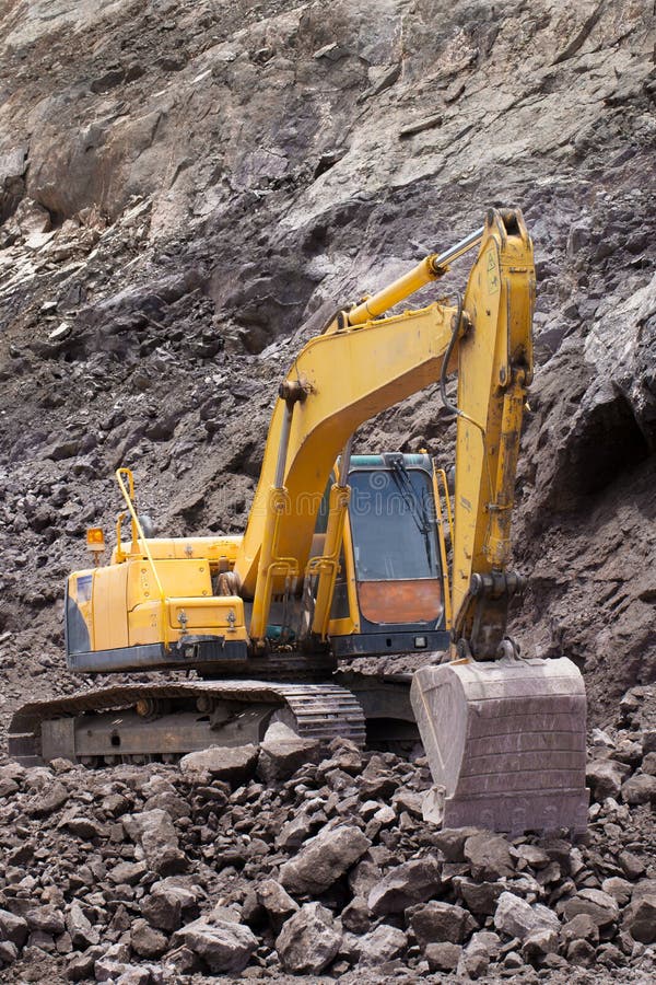 Excavator in the rock mine stock photo. Image of eathmoving - 41445514