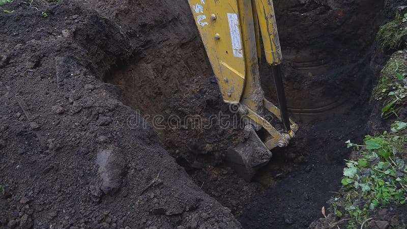 Excavator Shovel Digging a Deep Hole Stock Video - Video of handling ...
