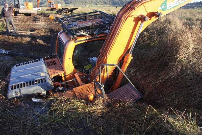 Excavator sinks editorial photo. Image of moorland, somerset - 21803571