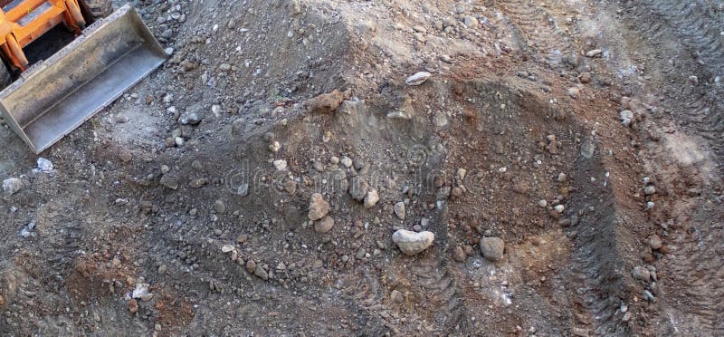 Excavator on the Site during Earthworks. Tractor Works at the ...