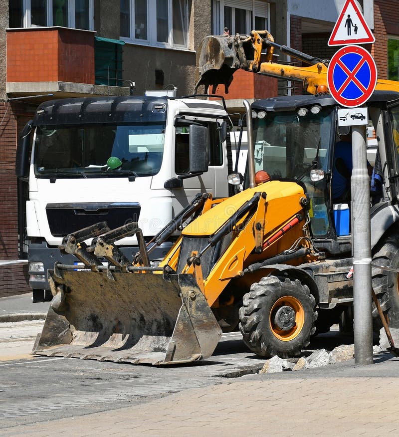 Excavator Stands at the Road Construction Stock Image - Image of ...