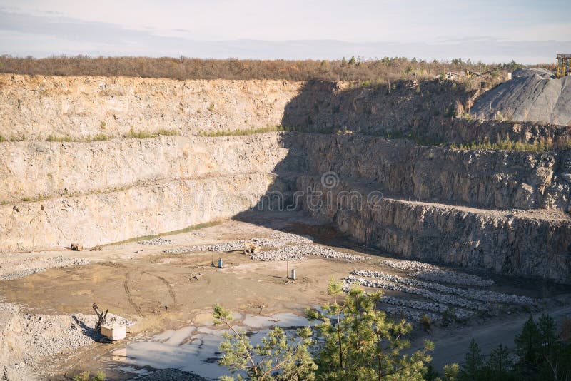 Excavator in a Stone Quarry for the Extraction of Crushed Stone and ...