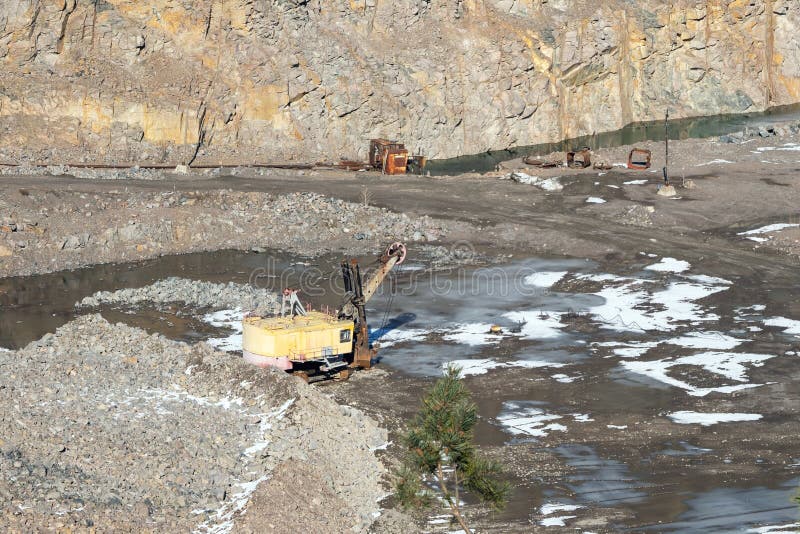 Excavator in a Stone Quarry for the Extraction of Crushed Stone and ...