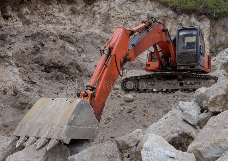 Excavator in stones stock image. Image of loader, quarry - 84662133