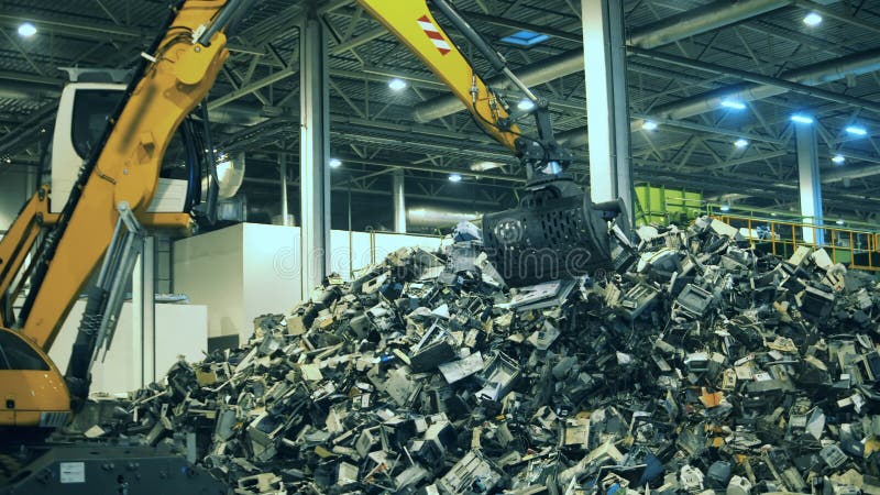Garbage, Plastic Recycling Factory. Excavator is Taking Garbage and ...