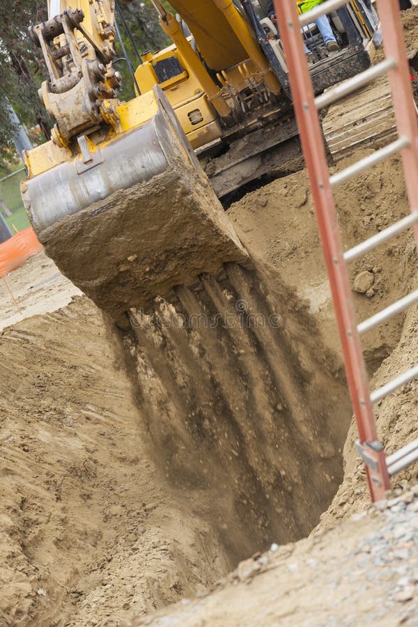 Excavator Tractor Digging a Trench Stock Photo - Image of mover, ground ...
