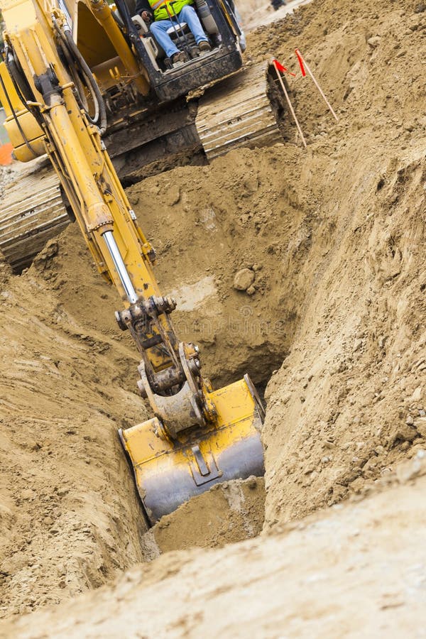 Excavator digging trench stock photo. Image of mound - 18866926