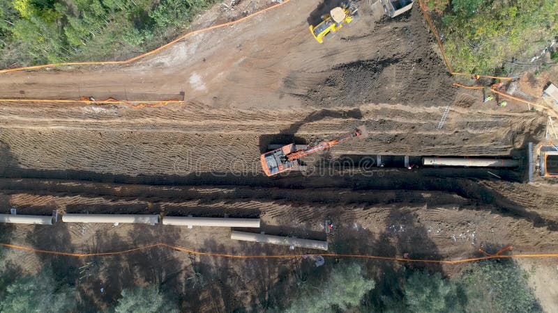 Loading Dirt, Debris and Junk on Truck Container. Aerial Shot Above ...
