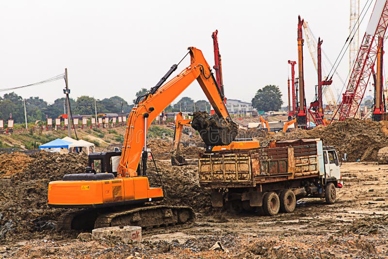 Excavator and truck stock photo. Image of activity, industry - 39119034