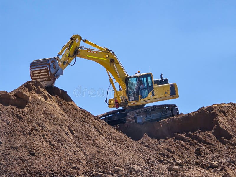 Excavator-type Earthmoving Machinery Extracting Materials Stock Photo ...