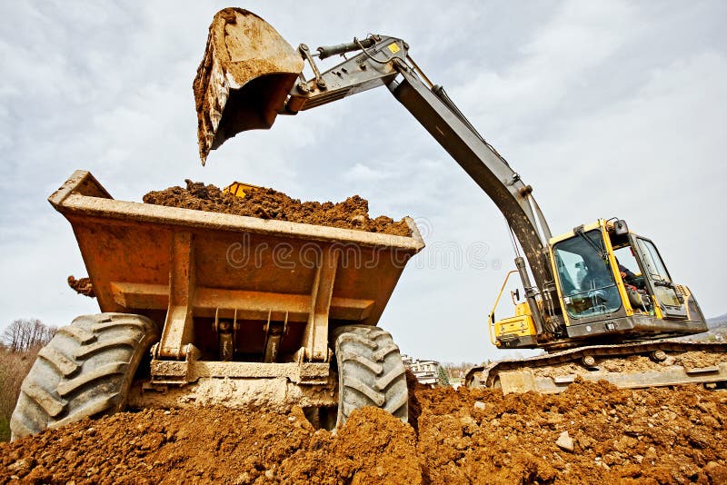 Excavator loading stock image. Image of construction - 103421219