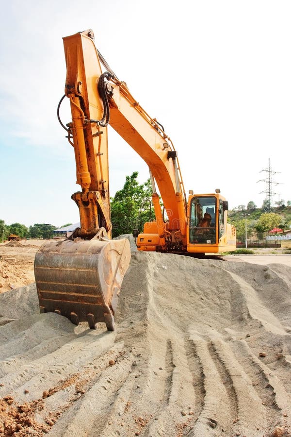 Excavator at work stock photo. Image of machinery, engineering - 9755164