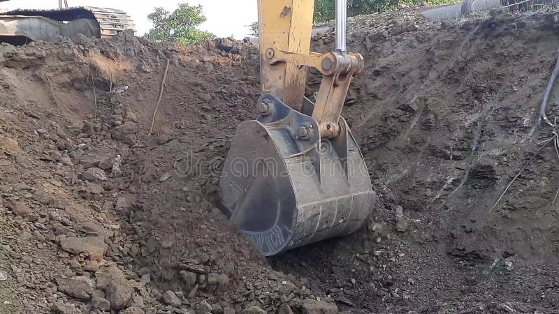 Working Backhoe by Digging Ground at Construction Site. Excavator ...