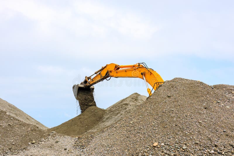 Excavator during Work, Excavator Bucket Scoops Sand Stock Photo - Image ...