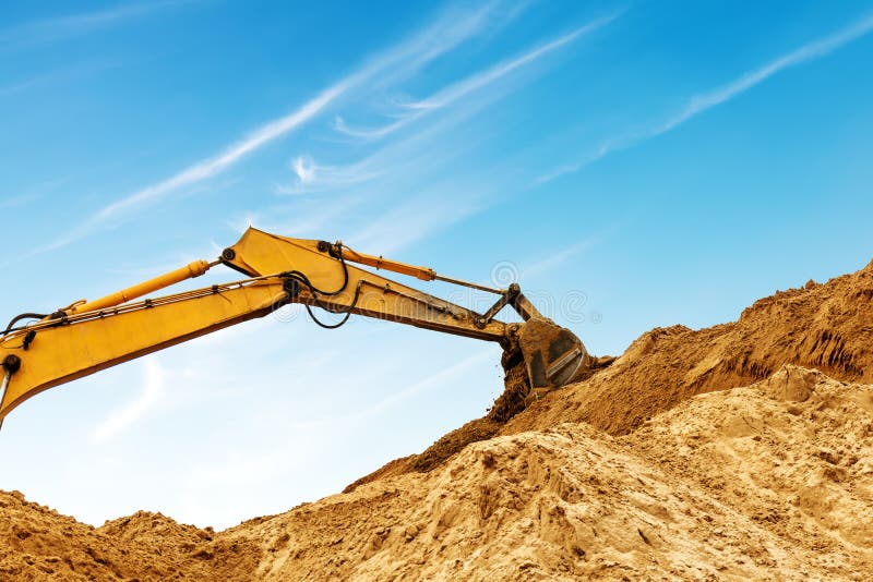An excavator at work stock photo. Image of tractor, hydraulic - 96793508