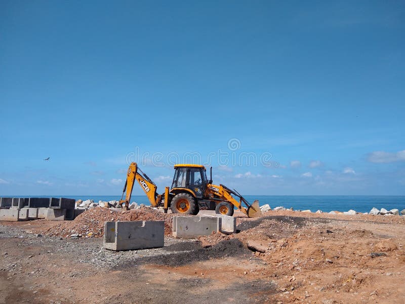 Excavator at Work, Kerala Coastline, Blue Sky Background, Seascape View ...
