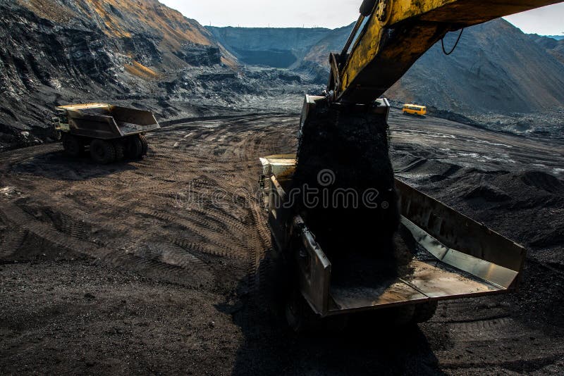 Excavator at Work in Open Pit Stock Photo - Image of excavator, dirt ...