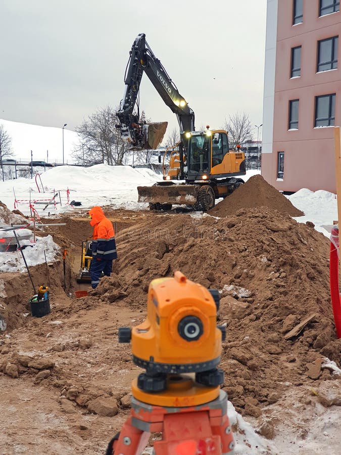 Excavator and Worker on Construction Site Stock Image - Image of home ...