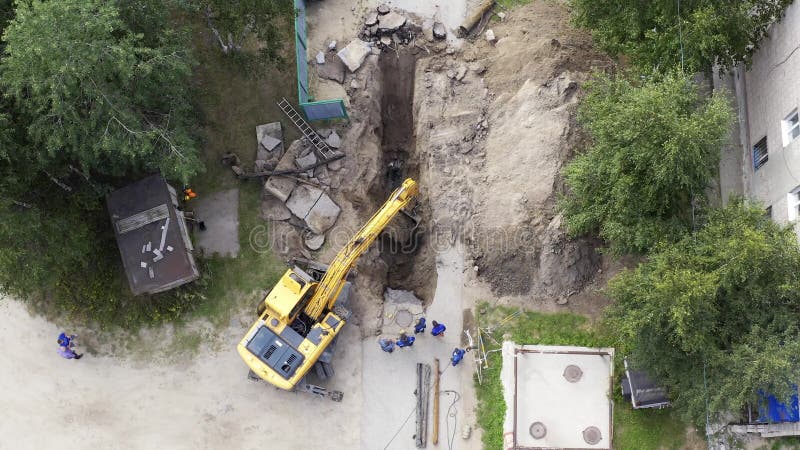 Excavator and Workers Digging a Pipe Hole Stock Footage - Video of dirt ...