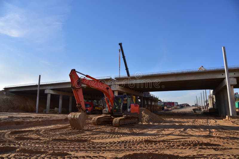 Excavator Working at Construction Highway Ramps and Bridgeworks ...