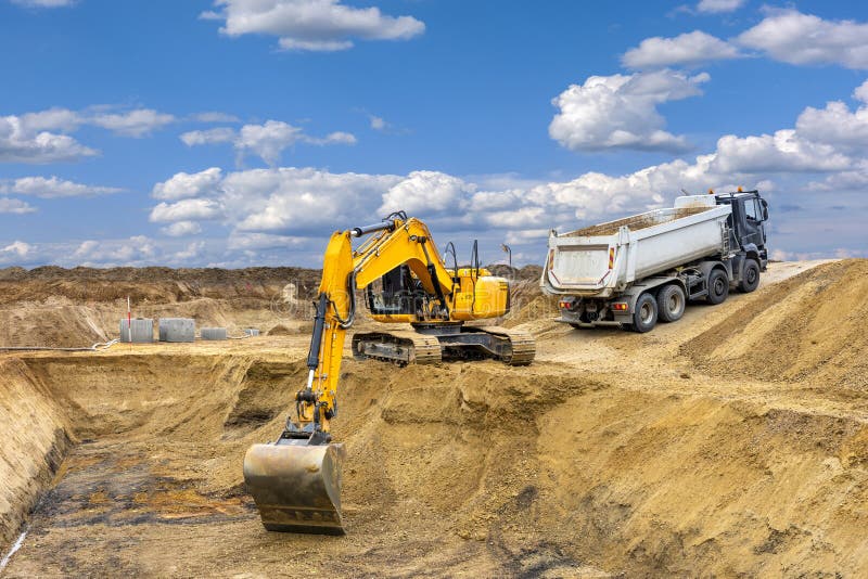 Excavator is Working and Digging at Construction Site Stock Image ...