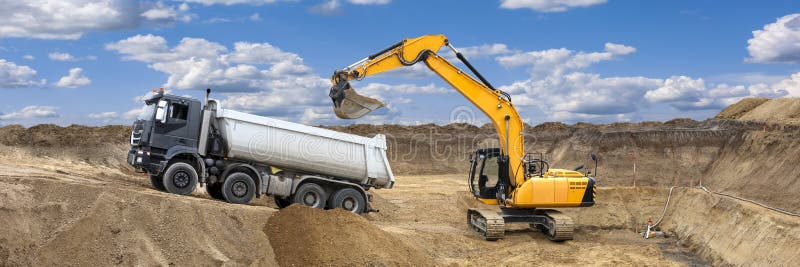 Excavator is Working and Digging at Construction Site Stock Photo ...