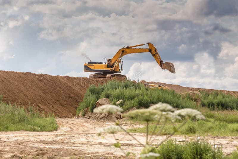 Excavator Working in the Field Stock Image - Image of digging, mover ...