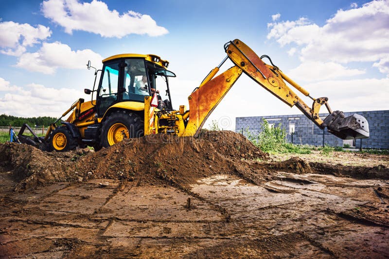 Excavator at House Construction Site - Digging Foundations for Modern ...