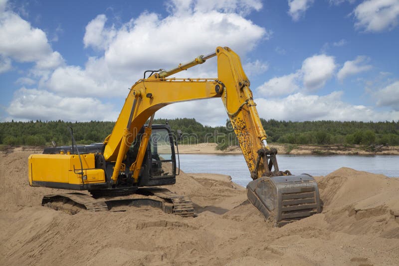 Excavator. the Excavator is Working on Loading Sand Stock Image - Image ...