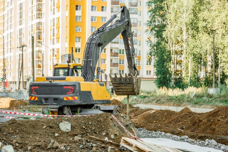 Excavator Working Outside on Road Construction Stock Photo - Image of ...