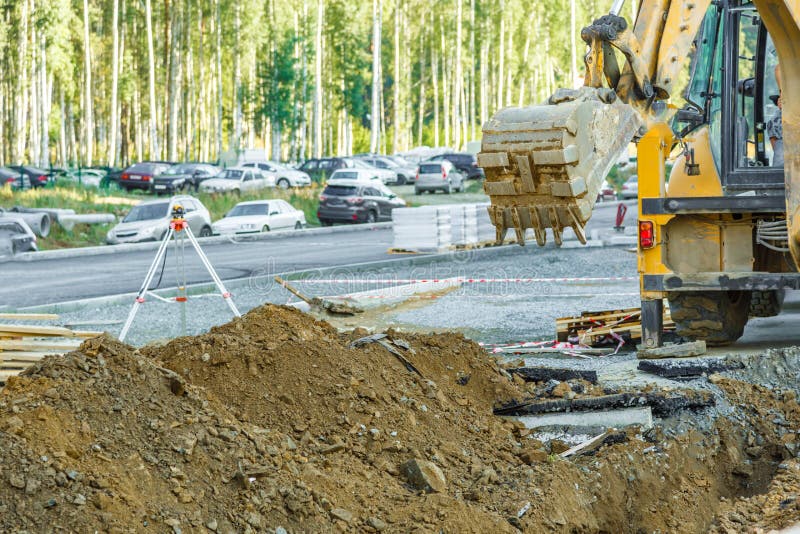 Excavator Working Outside on Road Construction Stock Image - Image of ...