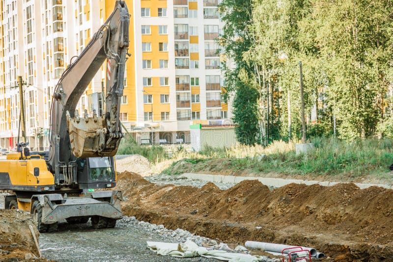 Excavator Working Outside on Road Construction Stock Image - Image of ...