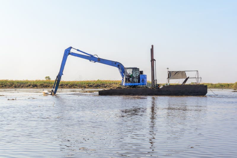 Excavator Working in the River Stock Photo - Image of dumper, bucket ...