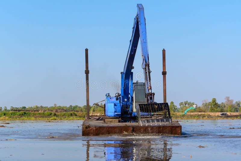 Excavator Working in the River Stock Image - Image of outdoors, digger ...