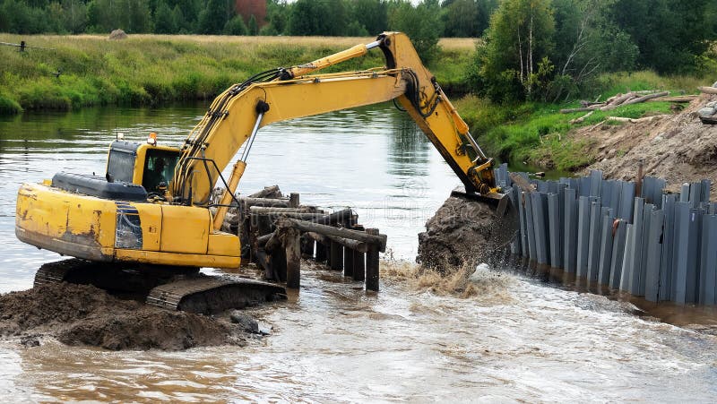 Excavator Working in the River Stock Photo - Image of river, riverside ...