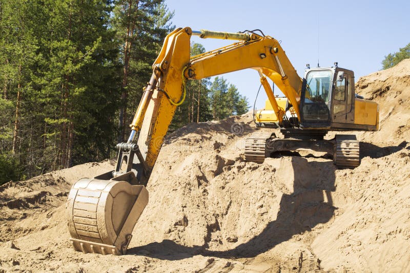 The Excavator is Working in a Sand Loading Quarry Stock Photo - Image ...