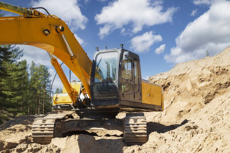 The Excavator is Working in a Sand Loading Quarry Stock Photo - Image ...