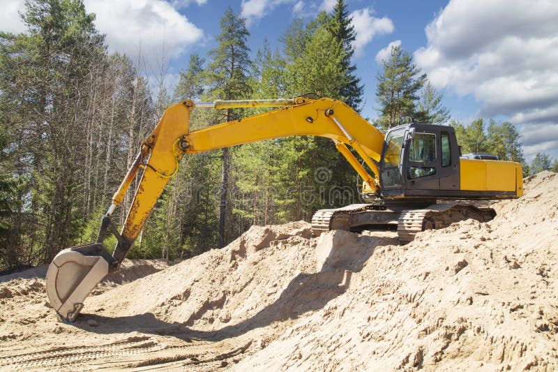 The Excavator is Working in a Sand Loading Quarry Stock Photo - Image ...