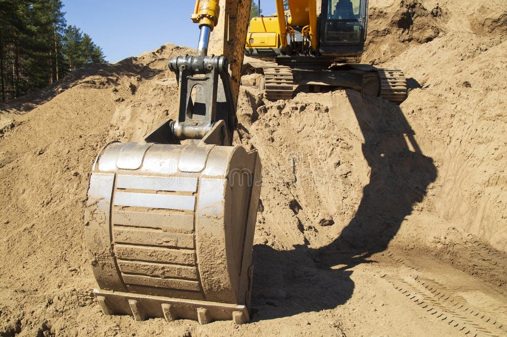 The Excavator is Working in a Sand Loading Quarry Stock Photo - Image ...