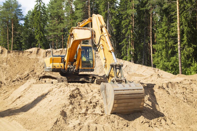 The Excavator is Working in a Sand Loading Quarry Stock Photo - Image ...