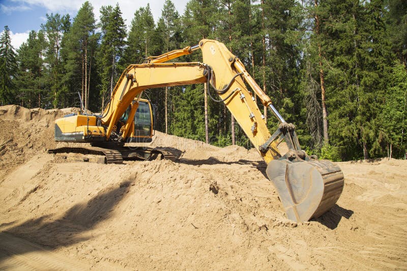 The Excavator is Working in a Sand Loading Quarry Stock Image - Image ...