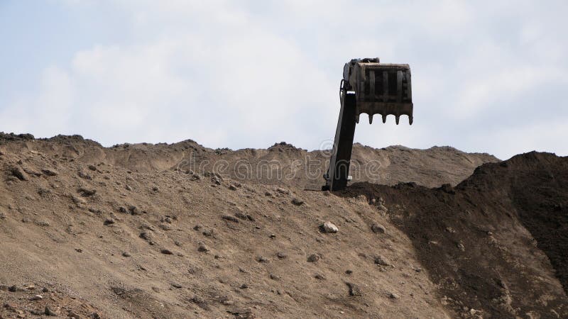Excavator Works on a Dump in Open Pit Mining. Heavy Construction ...