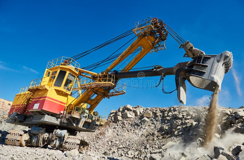 Excavator Works with Granite or Ore at Opencast Mining Stock Image ...