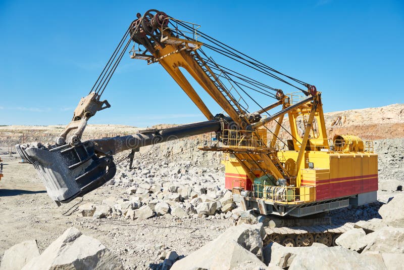 Excavator Works with Granite or Ore at Opencast Mining Stock Photo ...