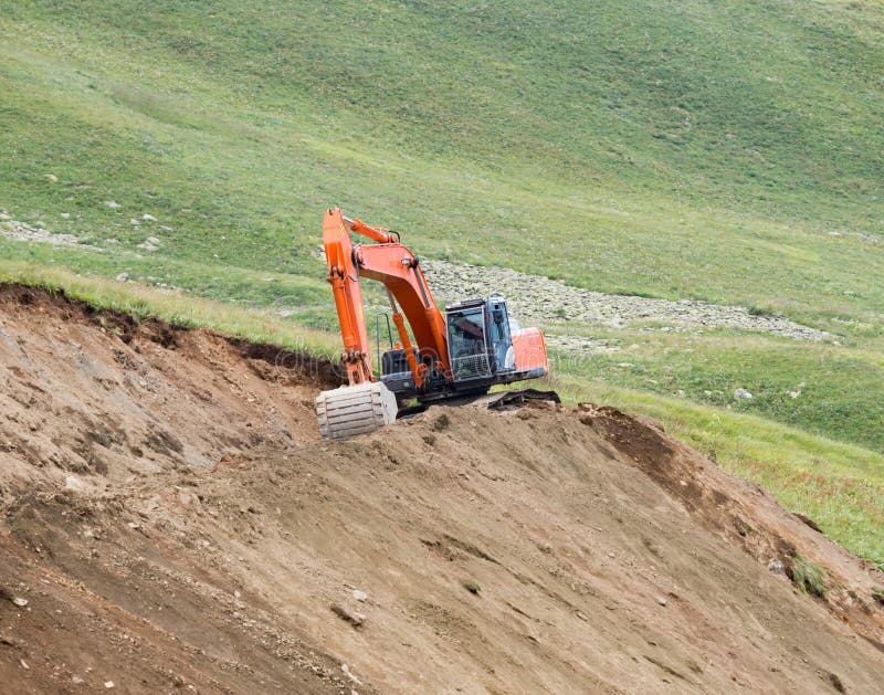 Excavators are Digging the Soil in the Construction Site. Stock Image ...