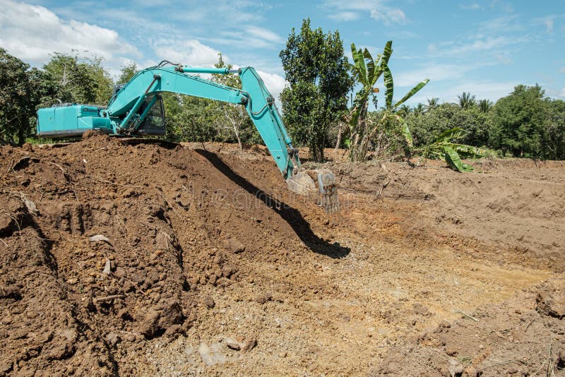 Excavators are Digging the Soil ,dig a Pond. Stock Image - Image of ...