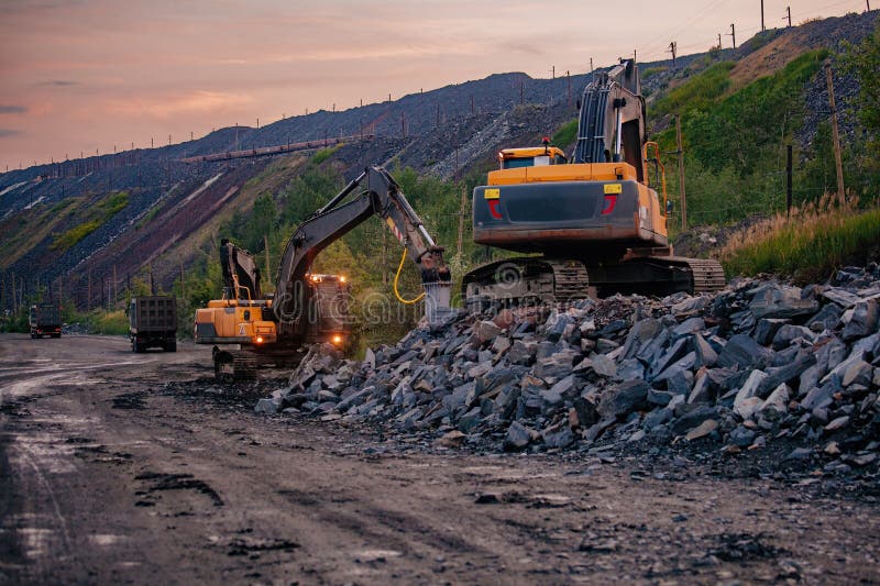 Excavators Working on Earthmoving at Open Pit Mine in Mining and ...