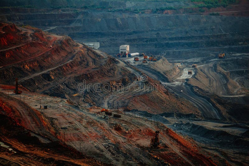 Excavators and Dump Trucks Working on Earthmoving at Open Pit Mine in ...