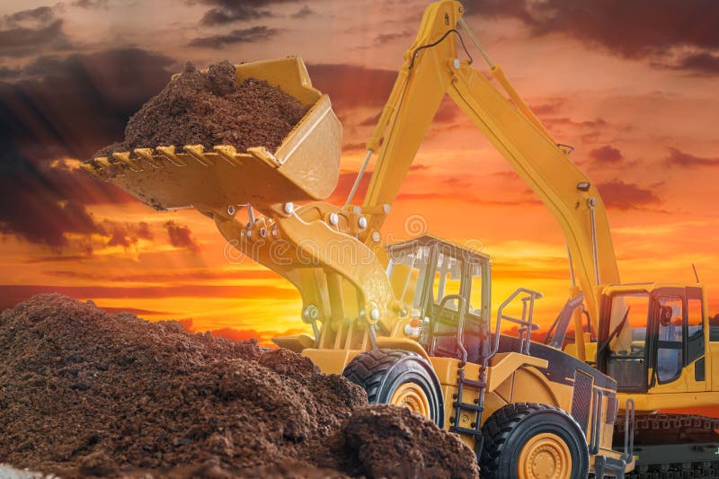 Excavators and Wheel Loader are Digging the Soil in the Construction ...